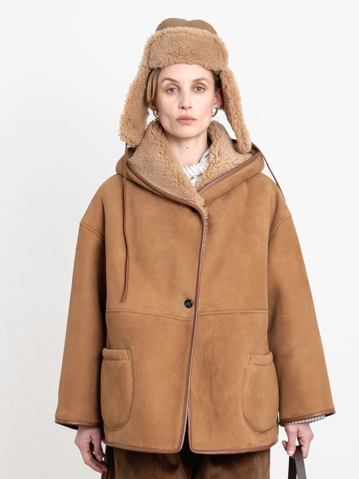 LEATHER BACK CURLY HAIR SHEEPSKIN TRAPPER HAT